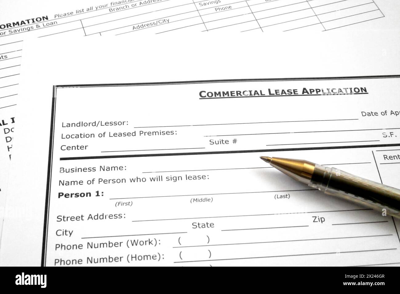 Pen on the top of an commercial lease application form Stock Photo - Alamy