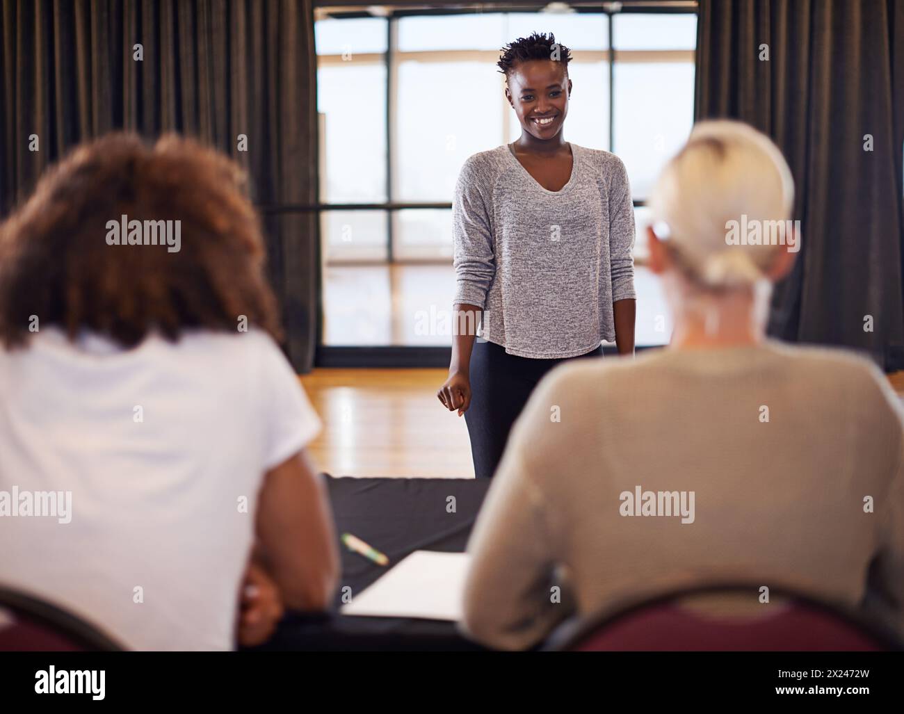 Woman, judge and dancer in casting audition to sign up for performance ...