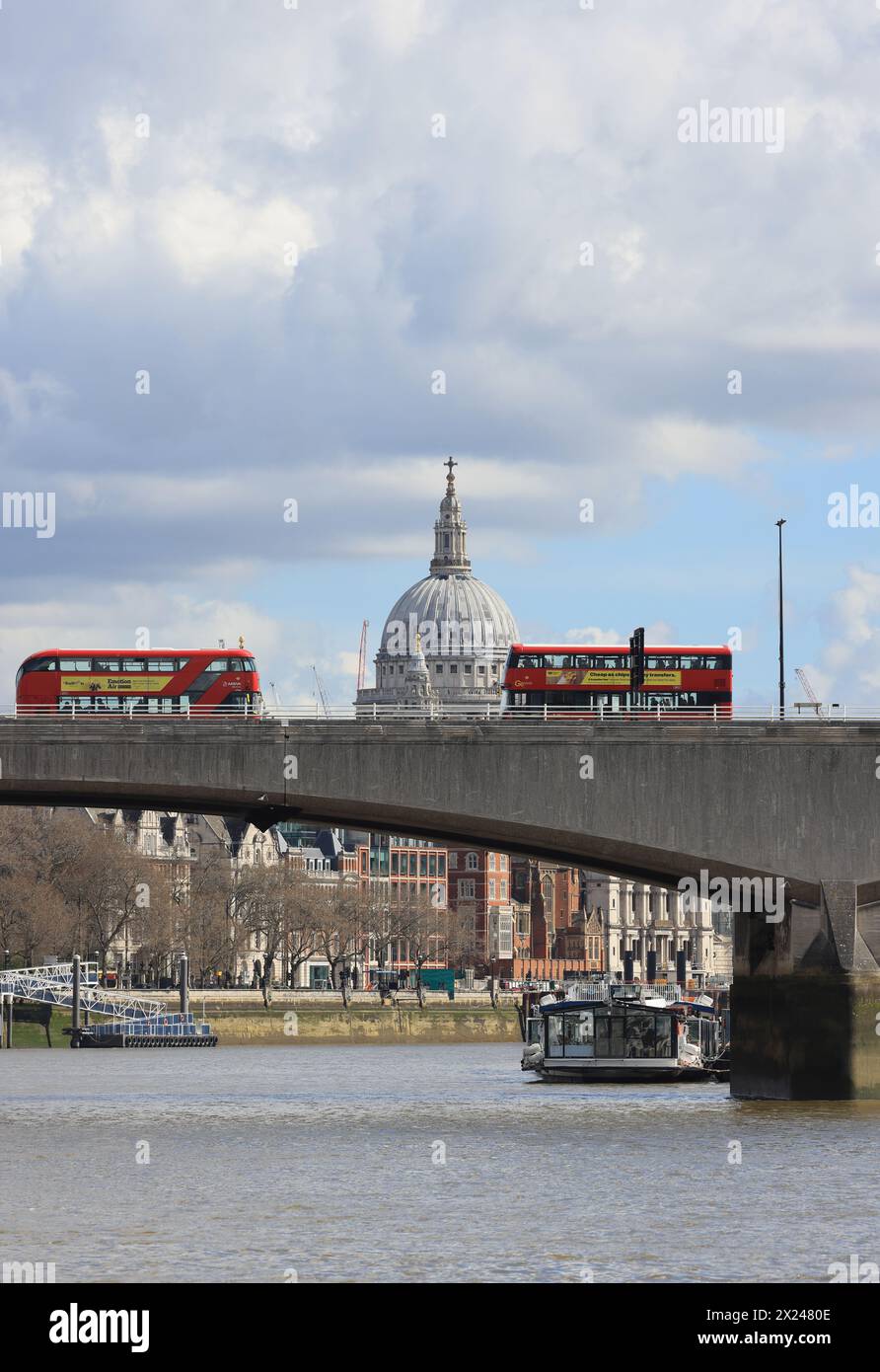 Red buses on Blackfriars Bridge over the River Thames, with St Paul's ...