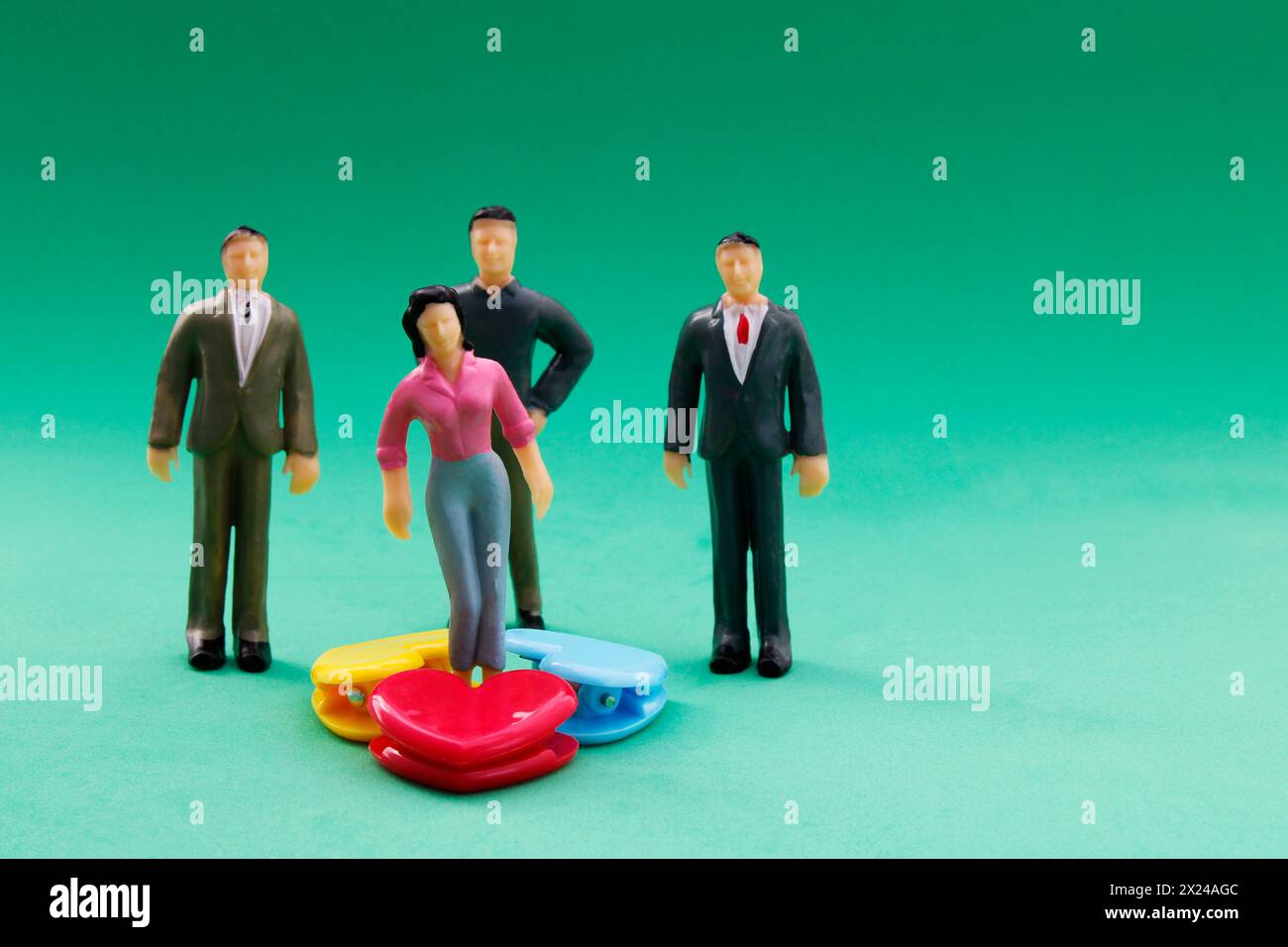 People and heart shaped clips marking different directions (plastic ...