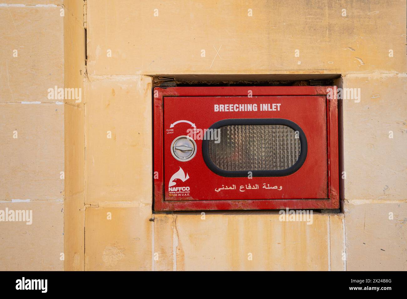 Valletta, Malta, April 04, 2024. fire hose container on a wall in the ...