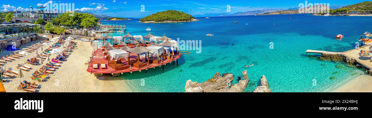 Leisure platform under crystal clear waters with an islet in the ...