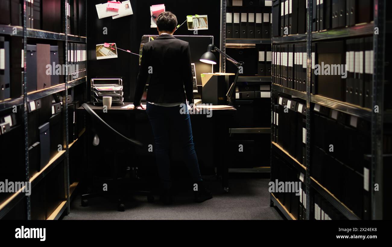 Professional detective working documents hi-res stock photography and ...