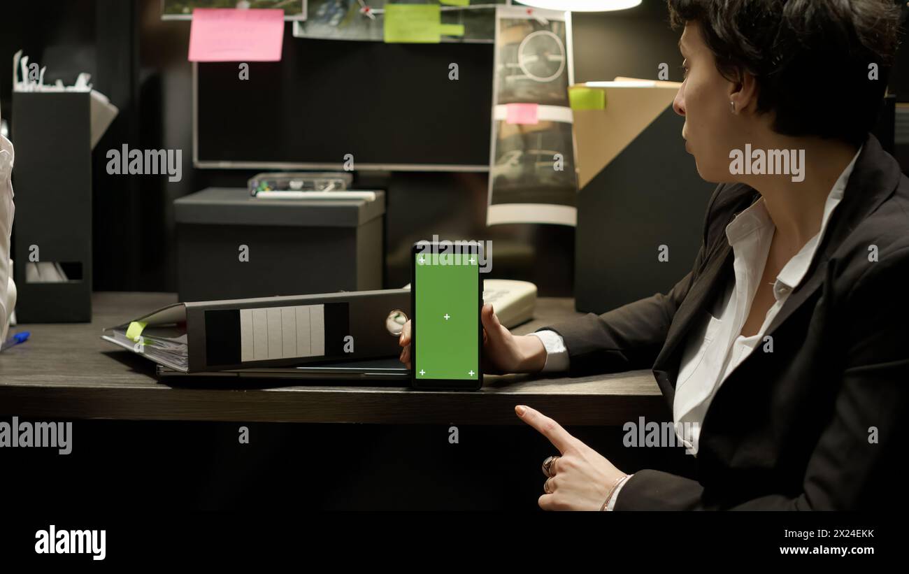 Criminologists using greenscreen display and investigating crime ...