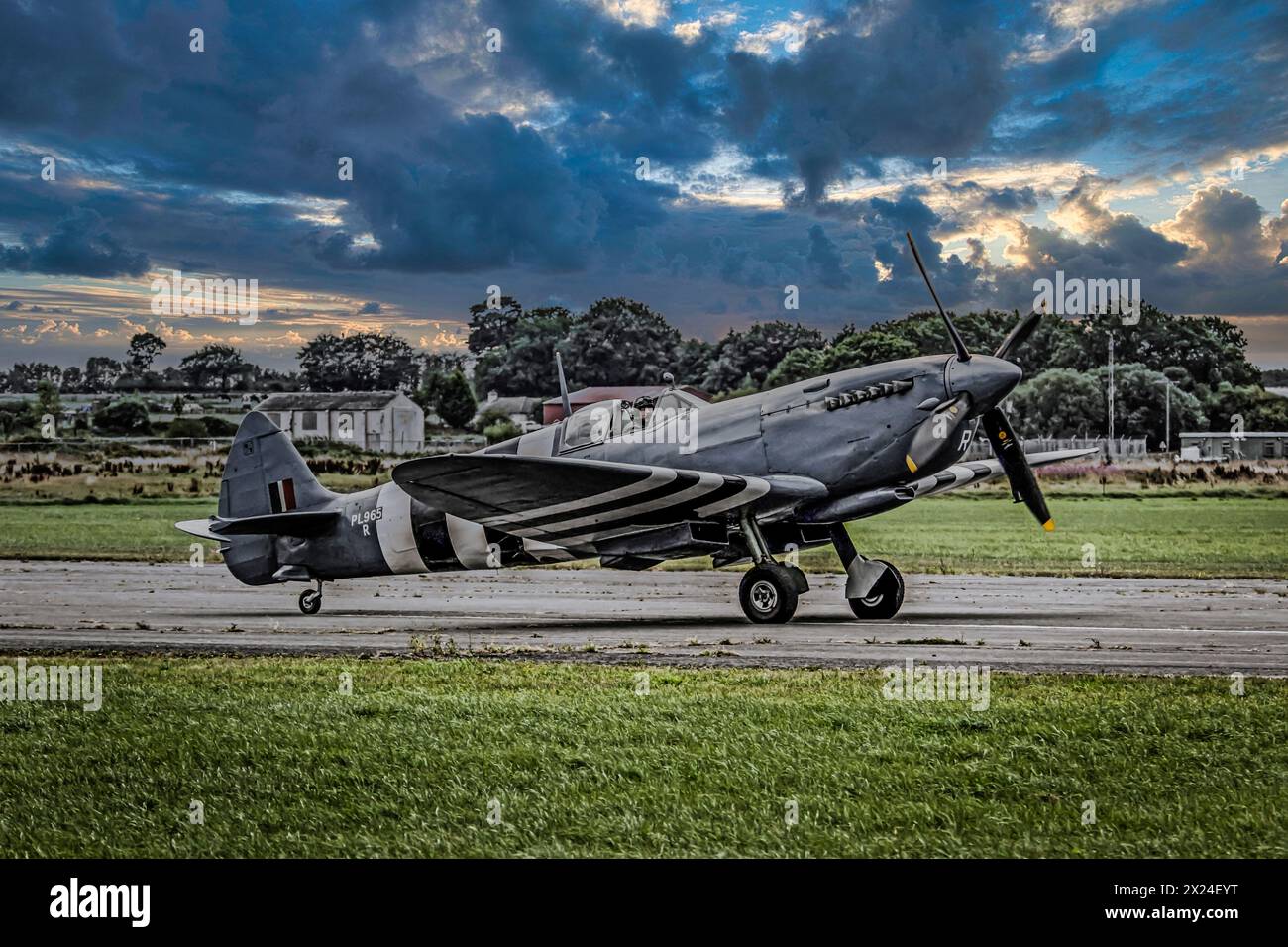 World War Two Spitfire. Photo recon Mark 11 in D-Day Markings Stock ...