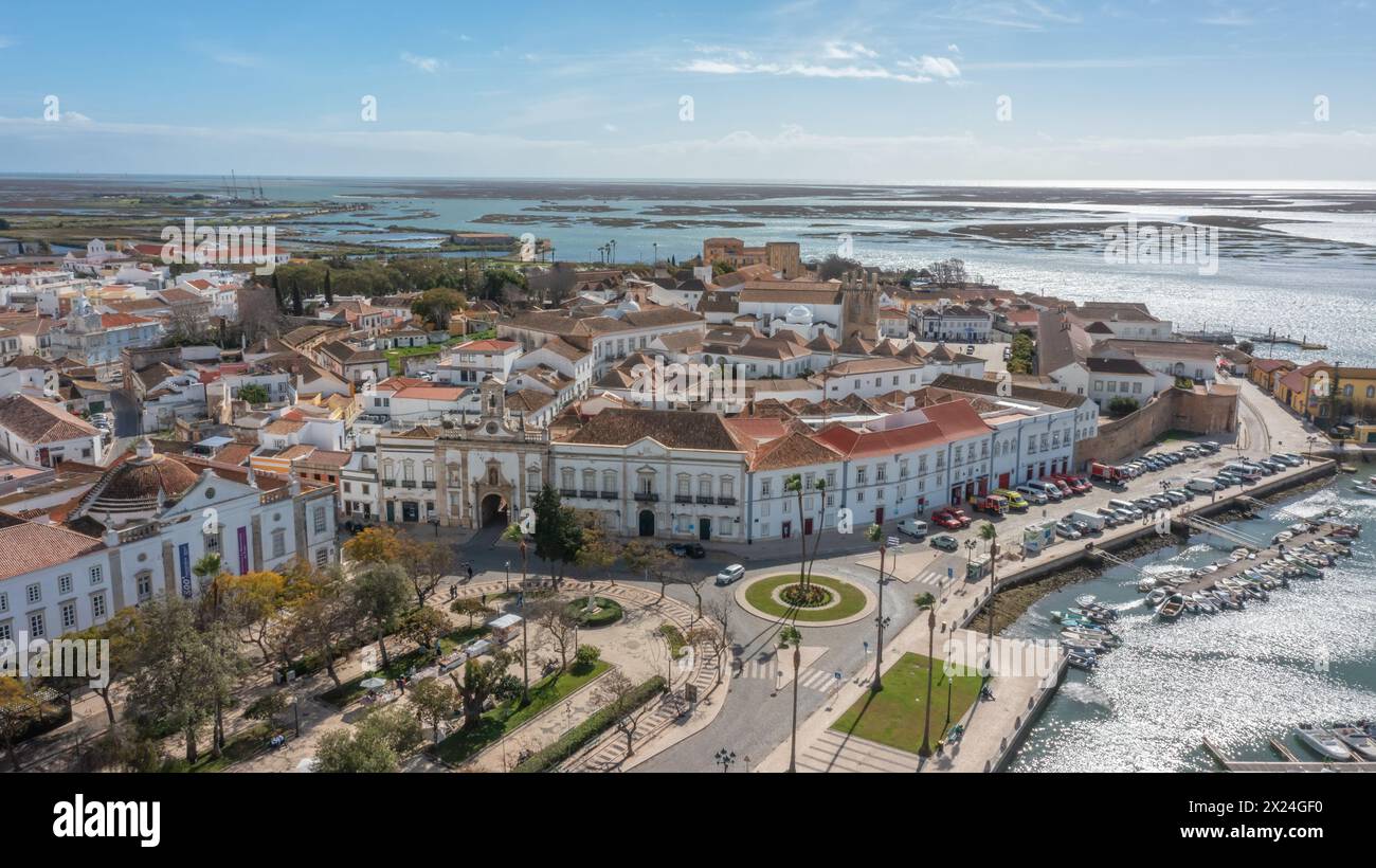 Traditional Portuguese town of Faro on oceanfront with old architecture ...