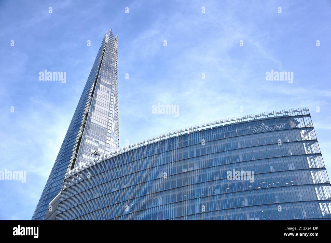 Blue spring sky forms backdrop to the shard hi-res stock photography ...