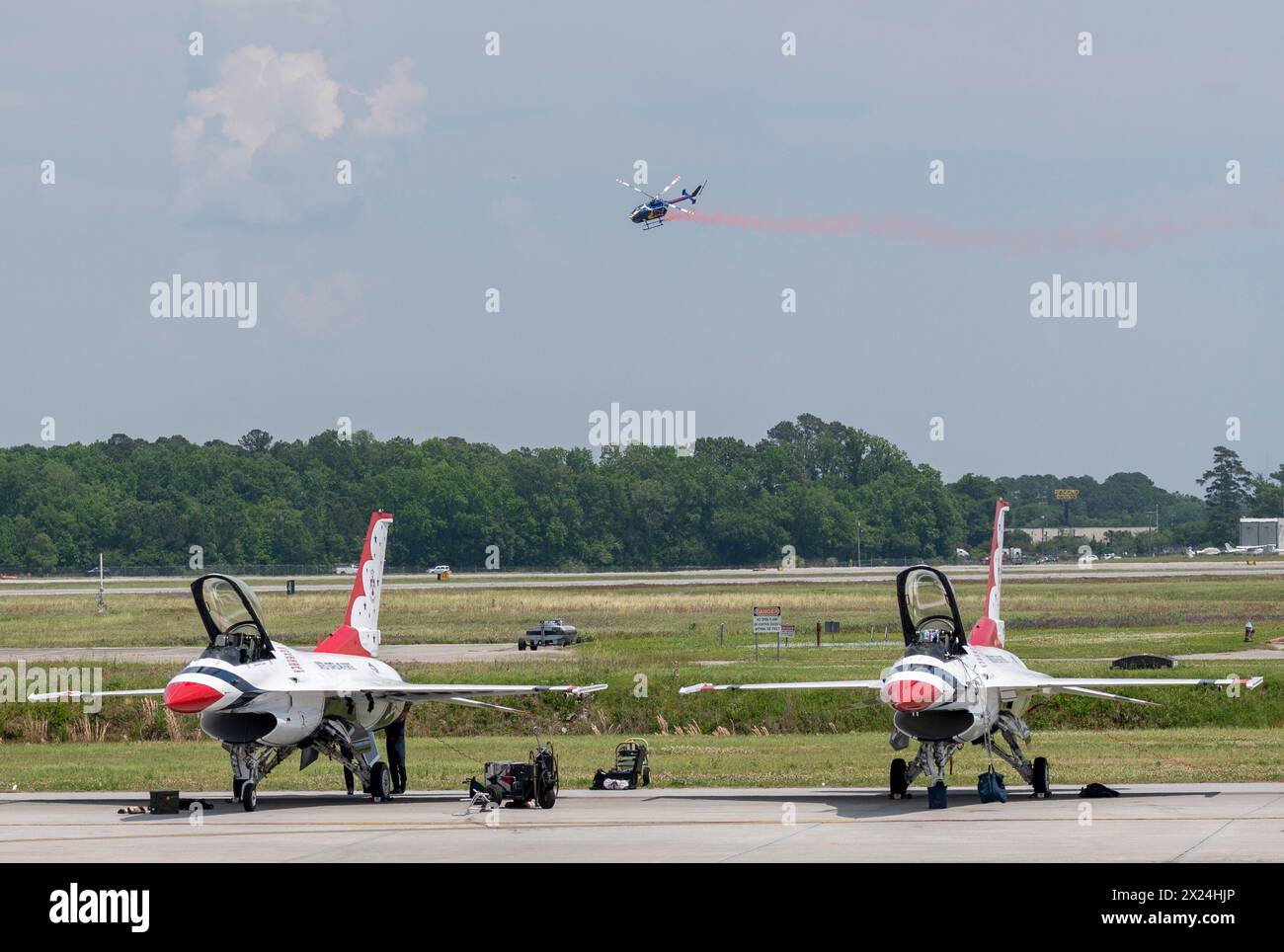 A Red Bull Air Force helicopter performs an aerial maneuver during the ...