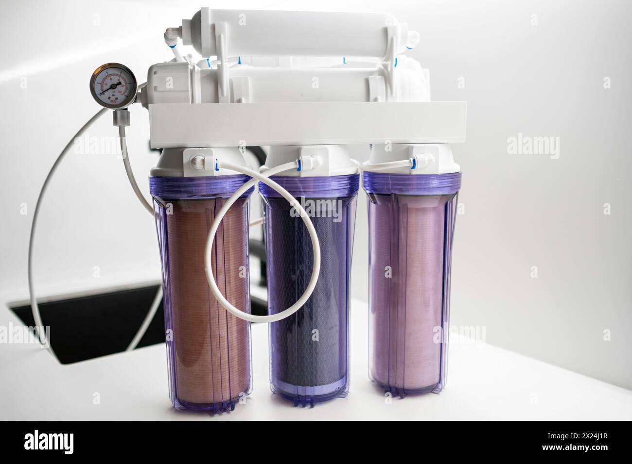 Reverse osmosis system for home water purification on the table in the ...