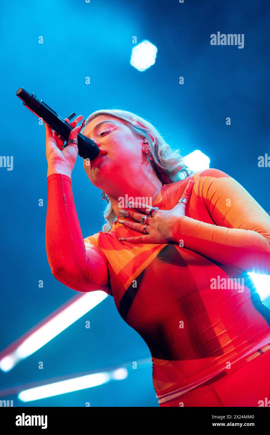 London, United Kingdom. 19th April 2024. Caity Baser performs for an ...