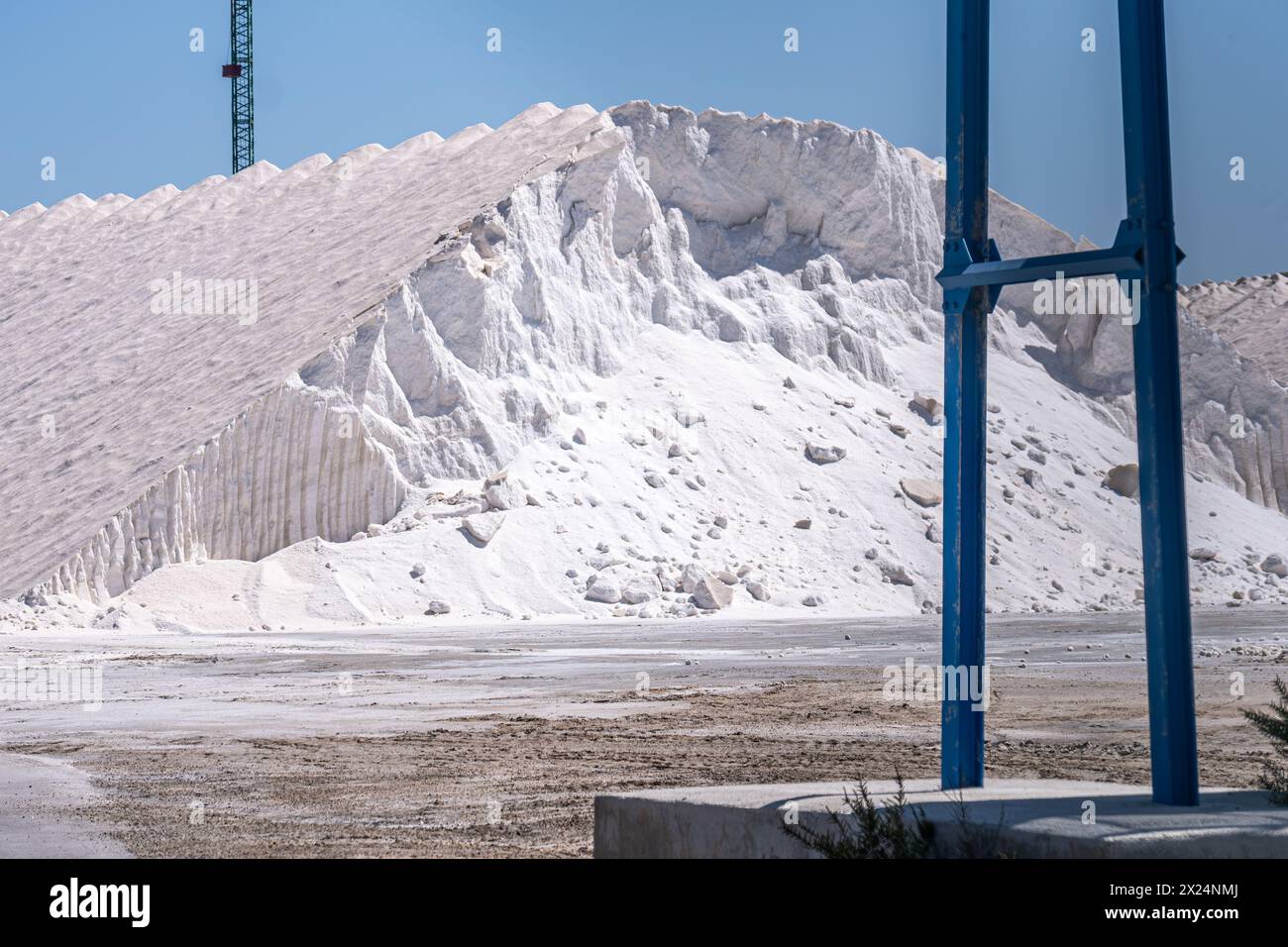 Vast mounds of salt dominate the scene, with industrial frames hinting ...