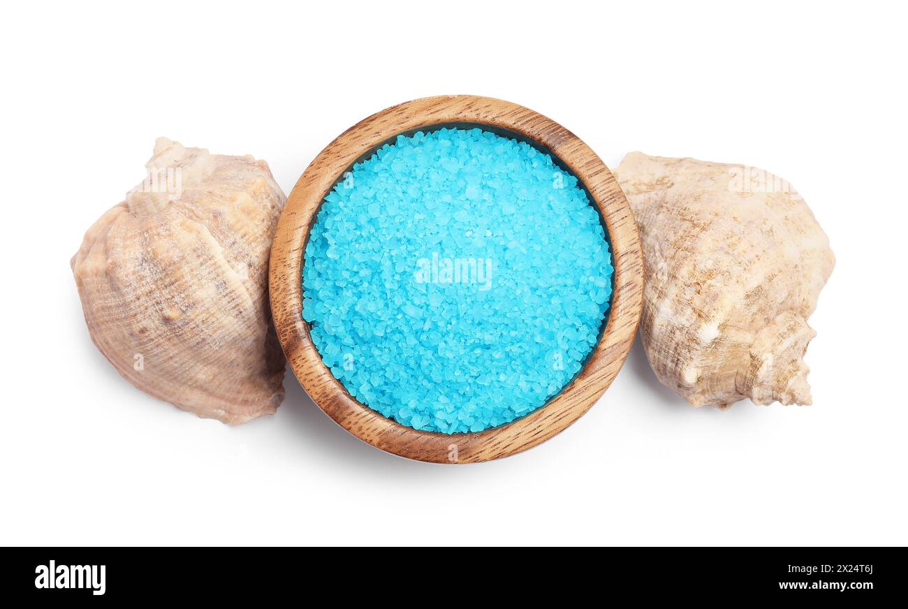 Light blue sea salt in bowl and shells isolated on white, top view ...
