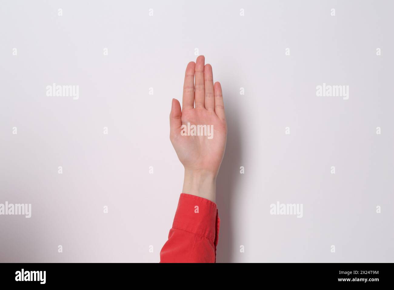 Woman showing open palm on white background, closeup Stock Photo - Alamy