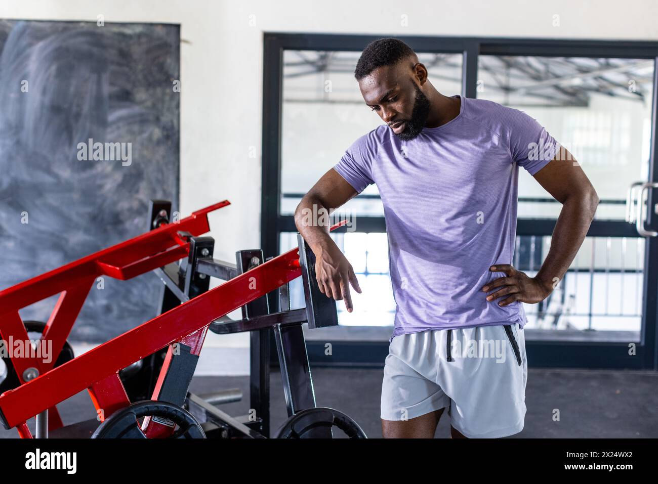 Thoughtful male athlete standing hi-res stock photography and images ...