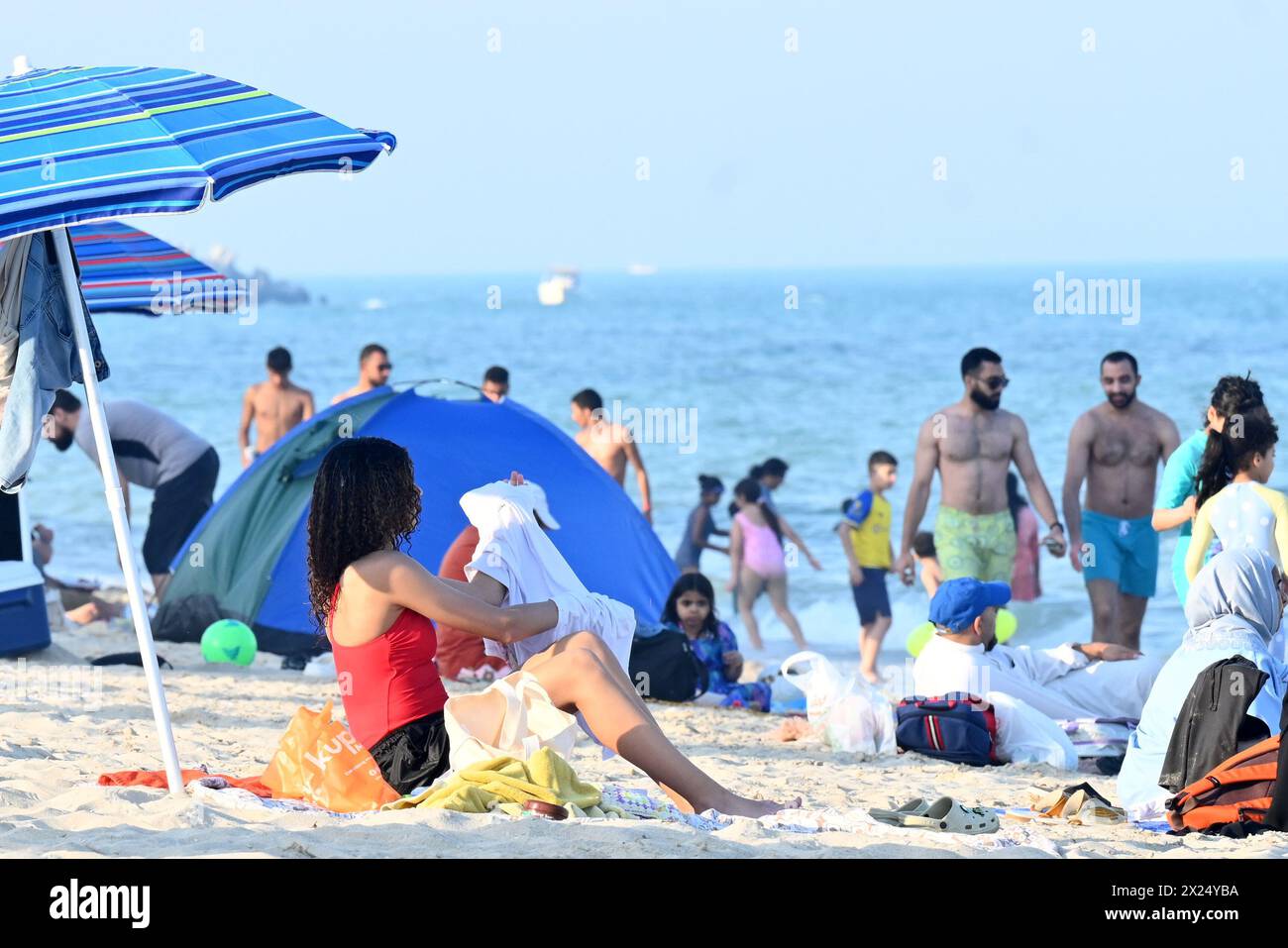 Hawalli Governorate, Kuwait. 19th Apr, 2024. People enjoy their time at ...
