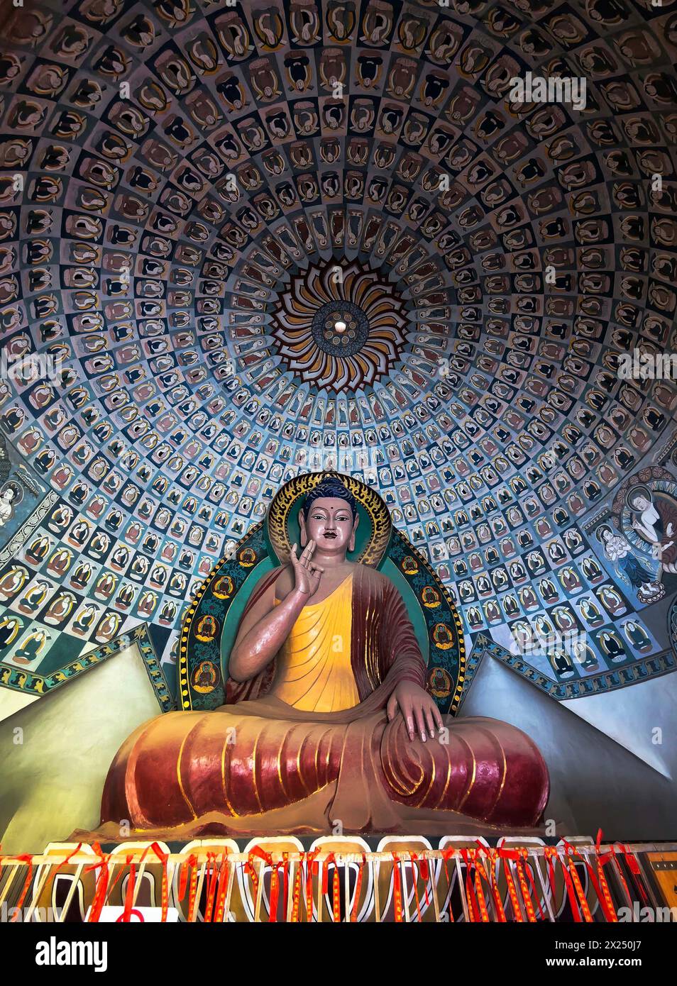 TURPAN, CHINA - APRIL 19, 2024 - A giant painted Buddha is seen at the ...