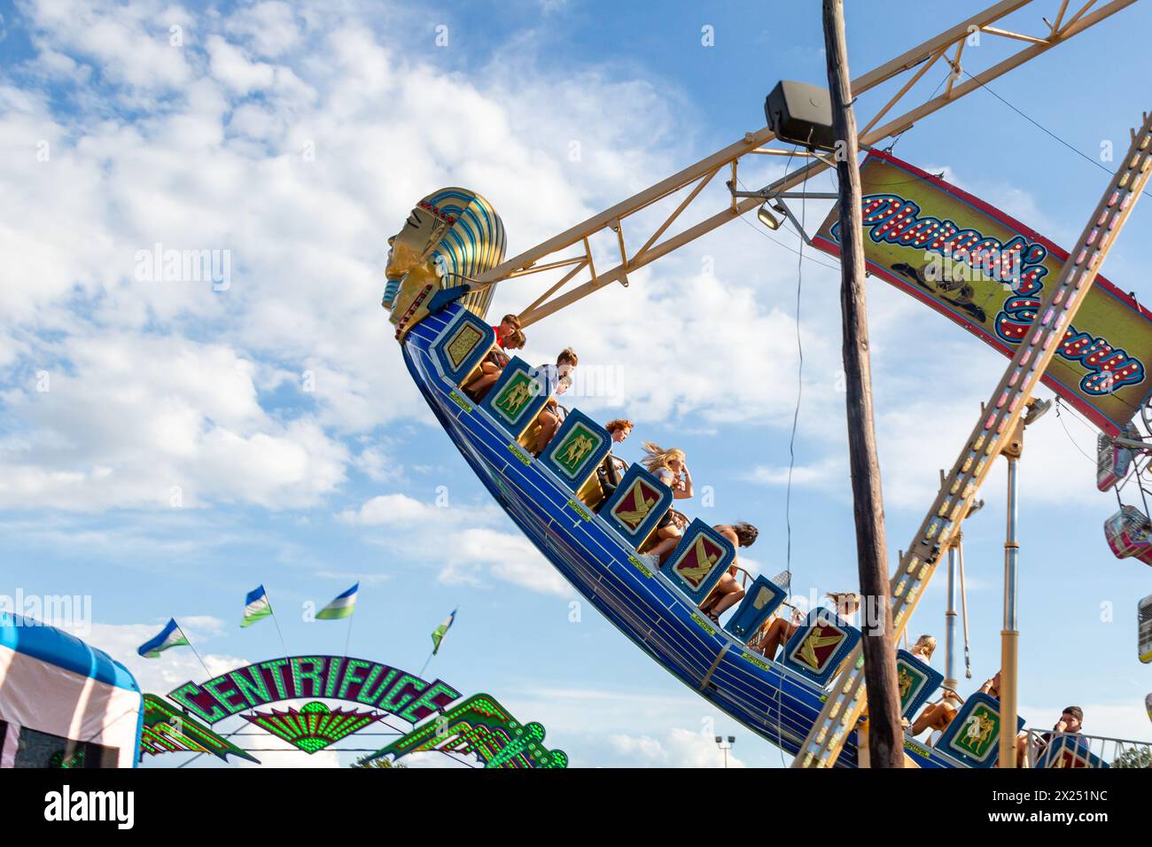 The amusement ride "Pharaoh's Fury" sends its thrill seekers toward the ...