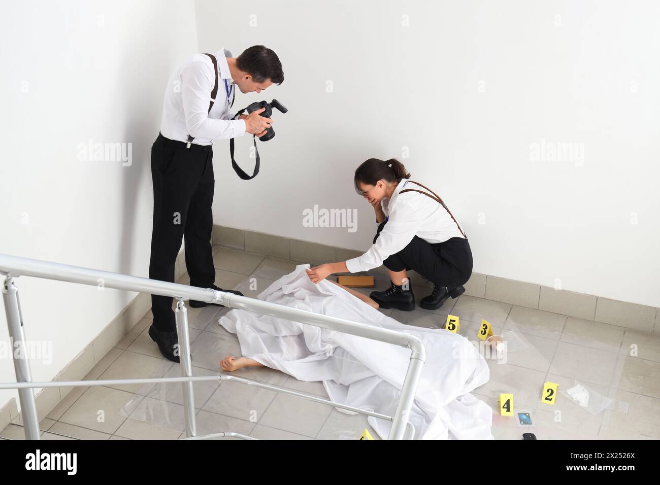 FBI agents working at crime scene with dead body Stock Photo - Alamy