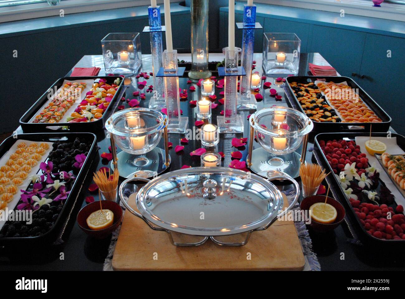 Festive cocktail reception hors d'oeuvre buffet table in New York, USA ...
