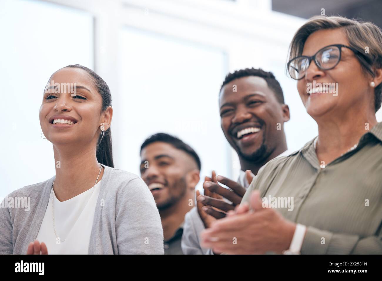 Excited businesswoman celebrating clapping hands hi-res stock ...