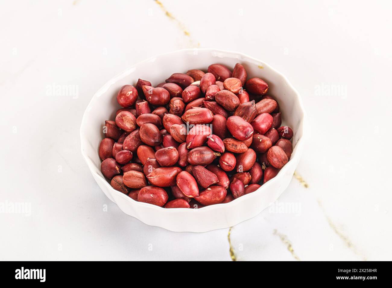 Raw ripe peanut heap for roast Stock Photo - Alamy