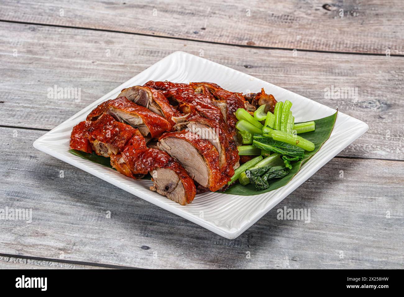 Asian cuisine - roasted duck meat with skin Stock Photo - Alamy
