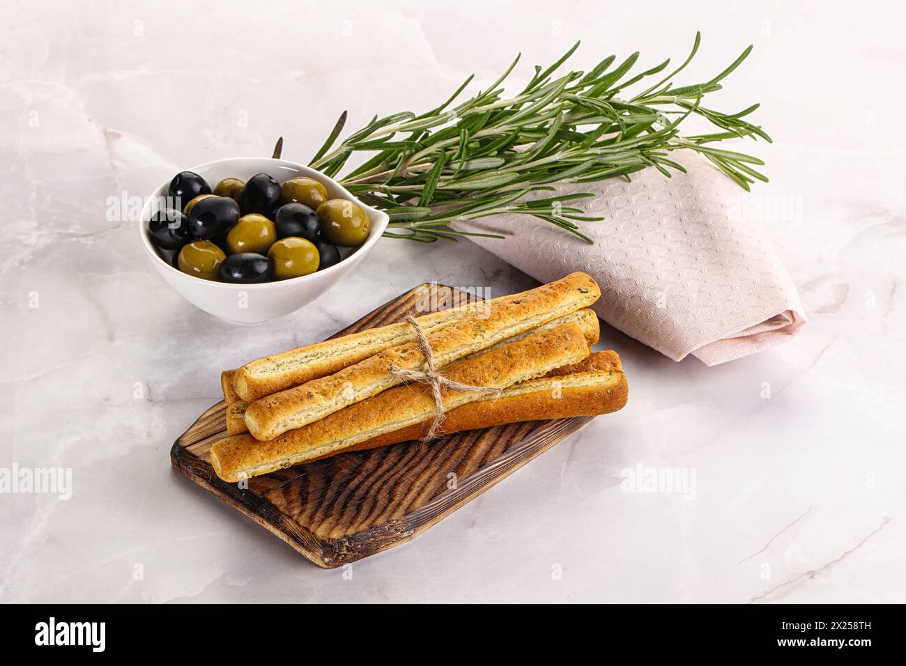 Crispy grissini italian bread heap snack Stock Photo - Alamy