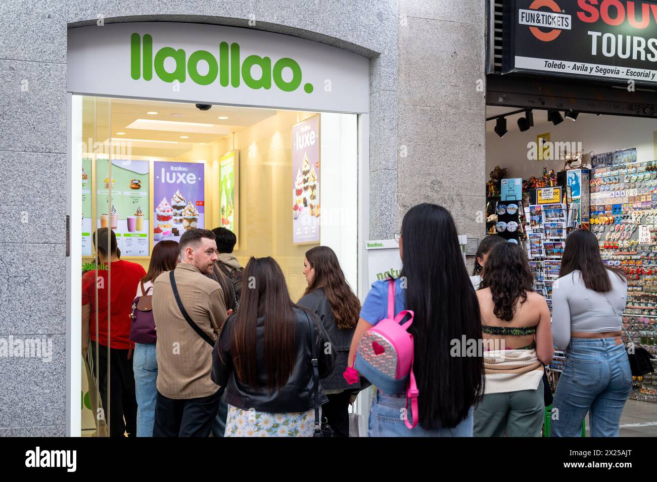 Madrid, Spain. 24th Mar, 2024. Customers queue in line at the Spanish ...