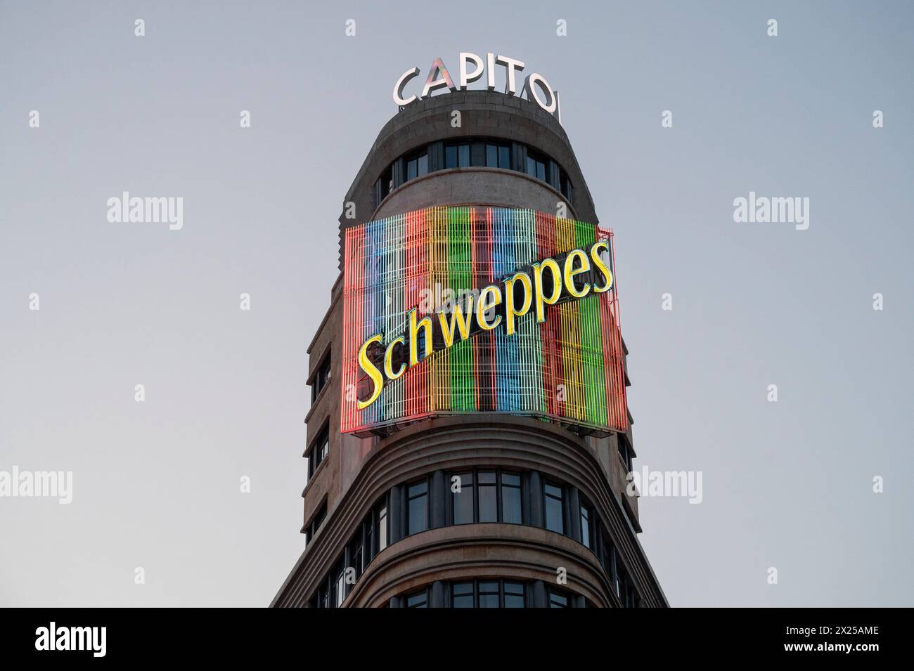 Madrid, Spain. 24th Mar, 2024. A vibrant Schweppes colorful neon sign ...