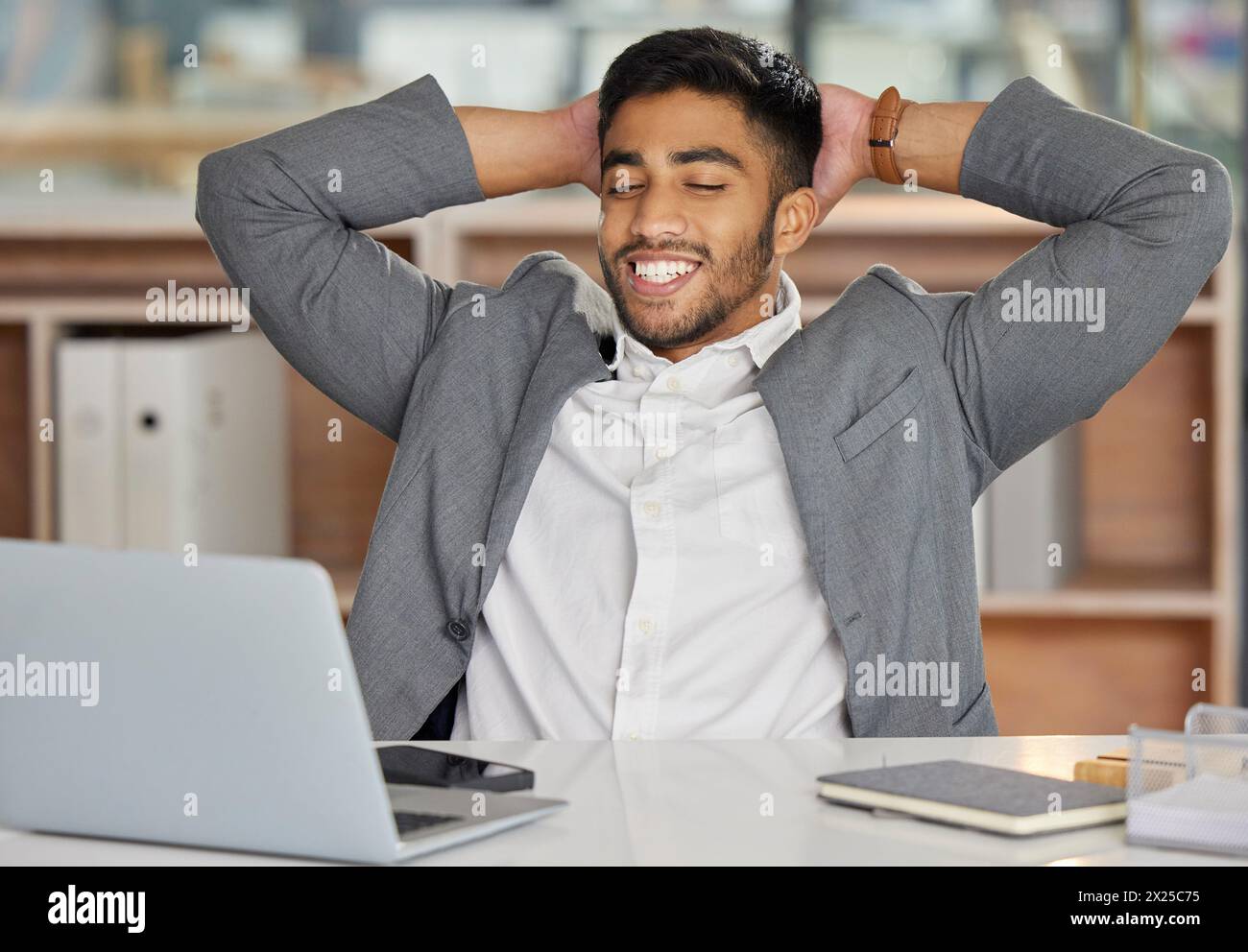 Finish, relax or happy businessman on break in office for task ...