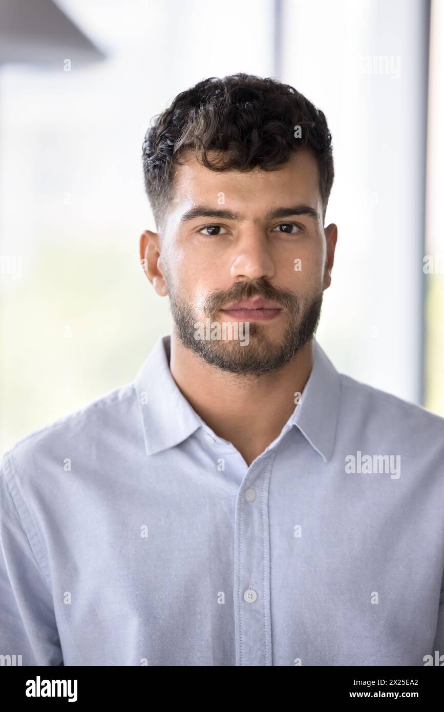 Serious Arab business man in formal shirt looking at camera Stock Photo ...