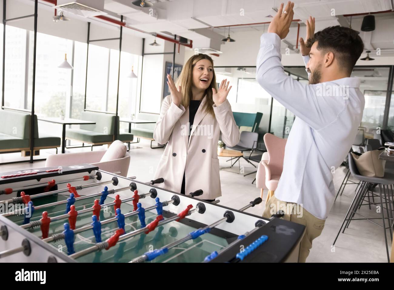 Two happy employees giving hi-res stock photography and images - Alamy