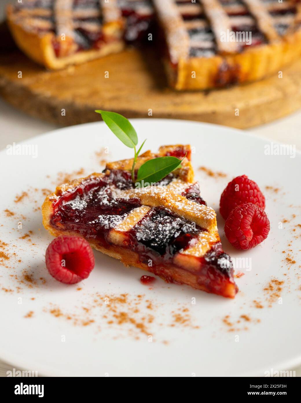Traditional Italian crostata filled with raspberry jam. Italian dessert ...
