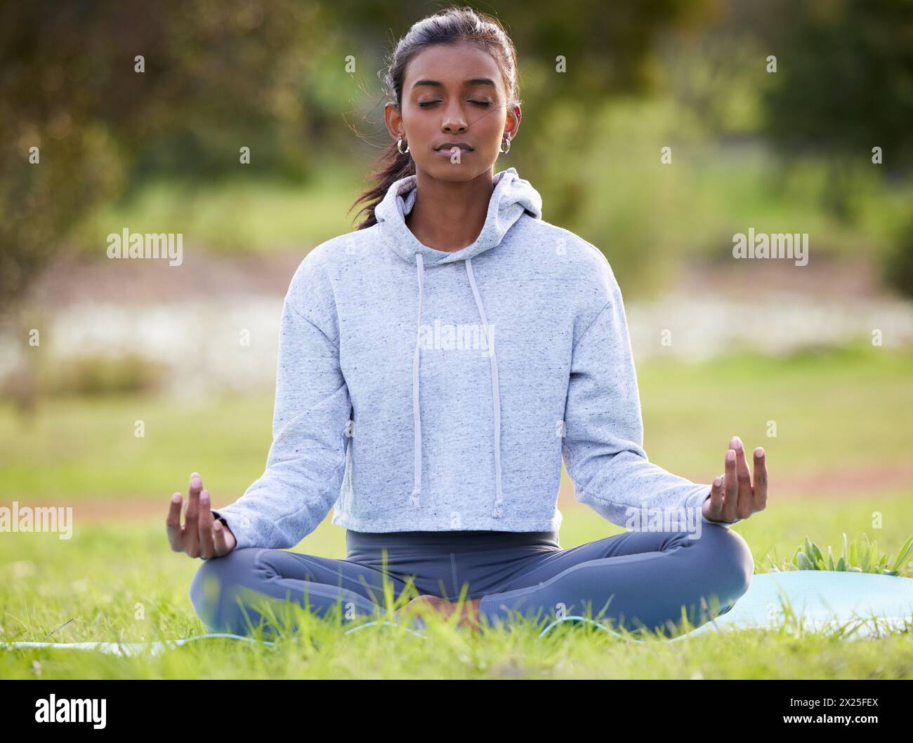 Yoga, meditation and Indian woman in park for wellness, healthy body ...