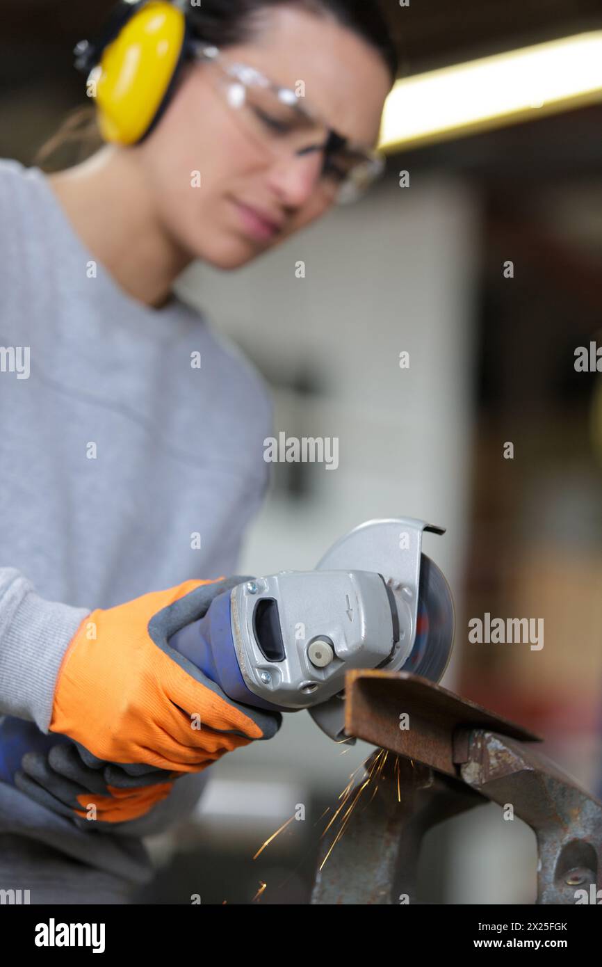 Grinding woman mechanic using hi-res stock photography and images - Alamy