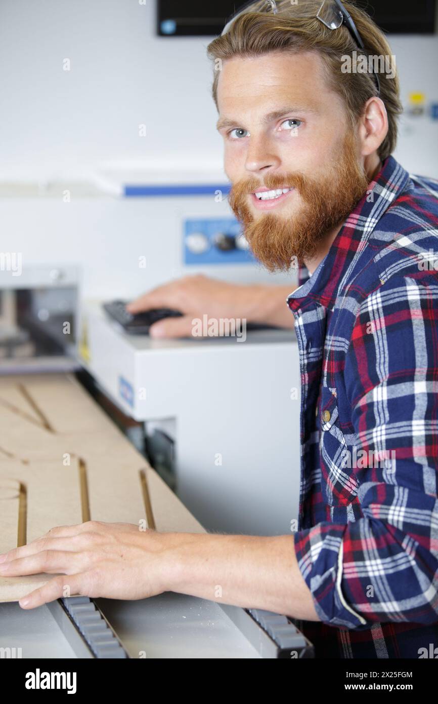 Dedicated young man using hi-res stock photography and images - Alamy