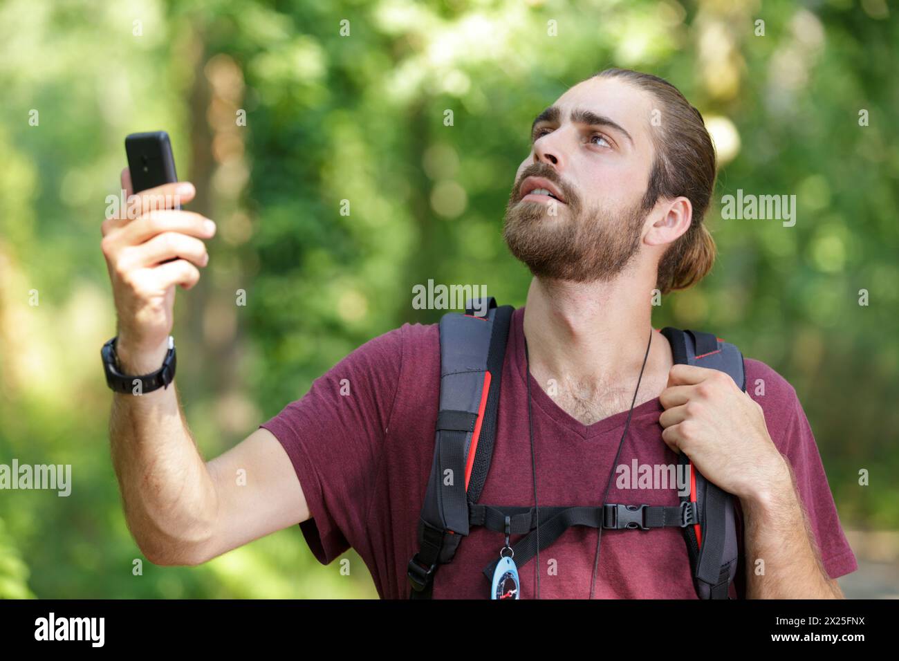 Man searching for signal hi-res stock photography and images - Alamy