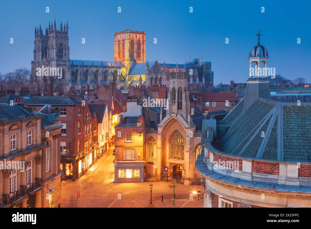 York Minster and Stonegate rooftops photographed during the blue hour ...