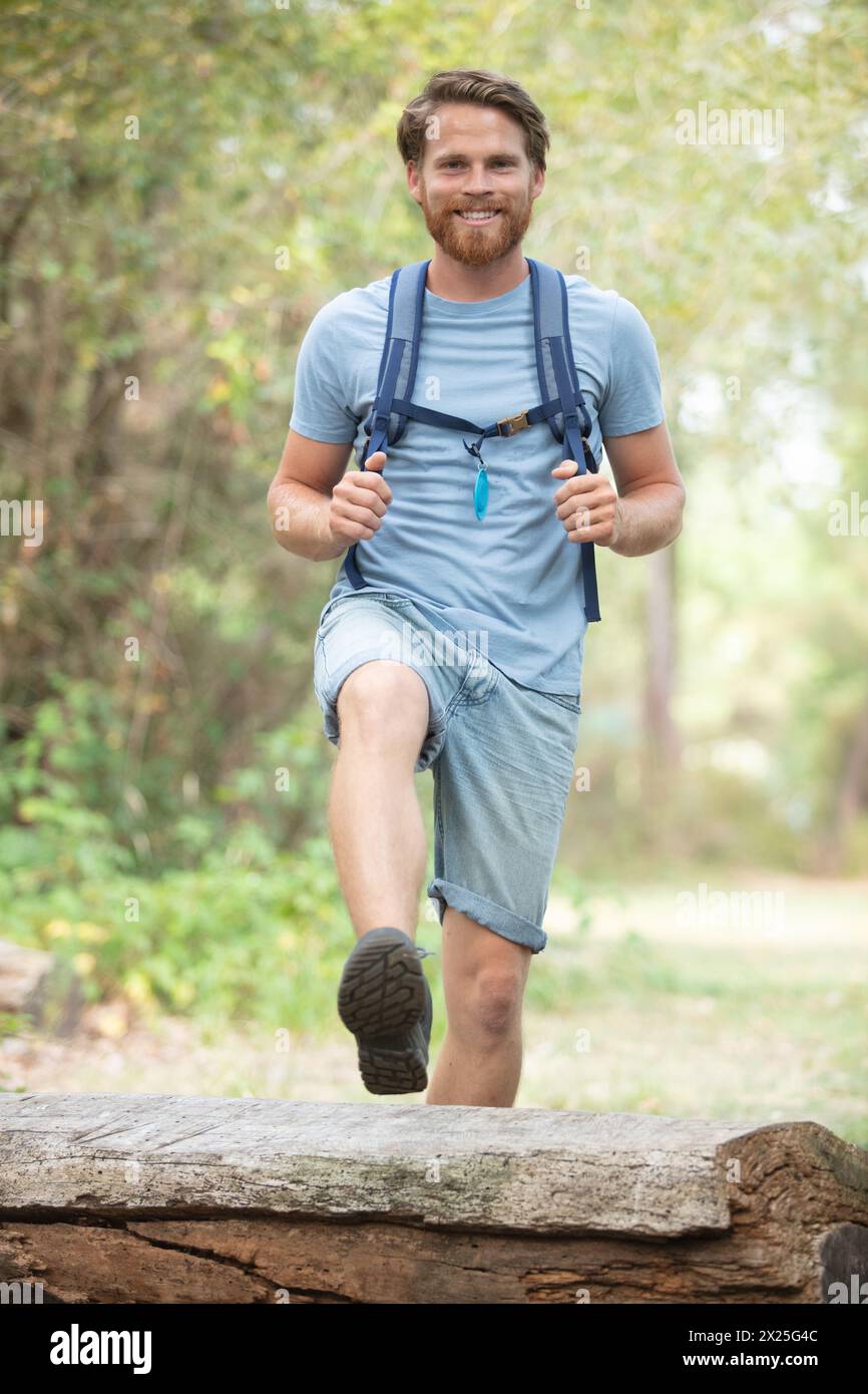 portrait of a young smiling wanderer man Stock Photo - Alamy
