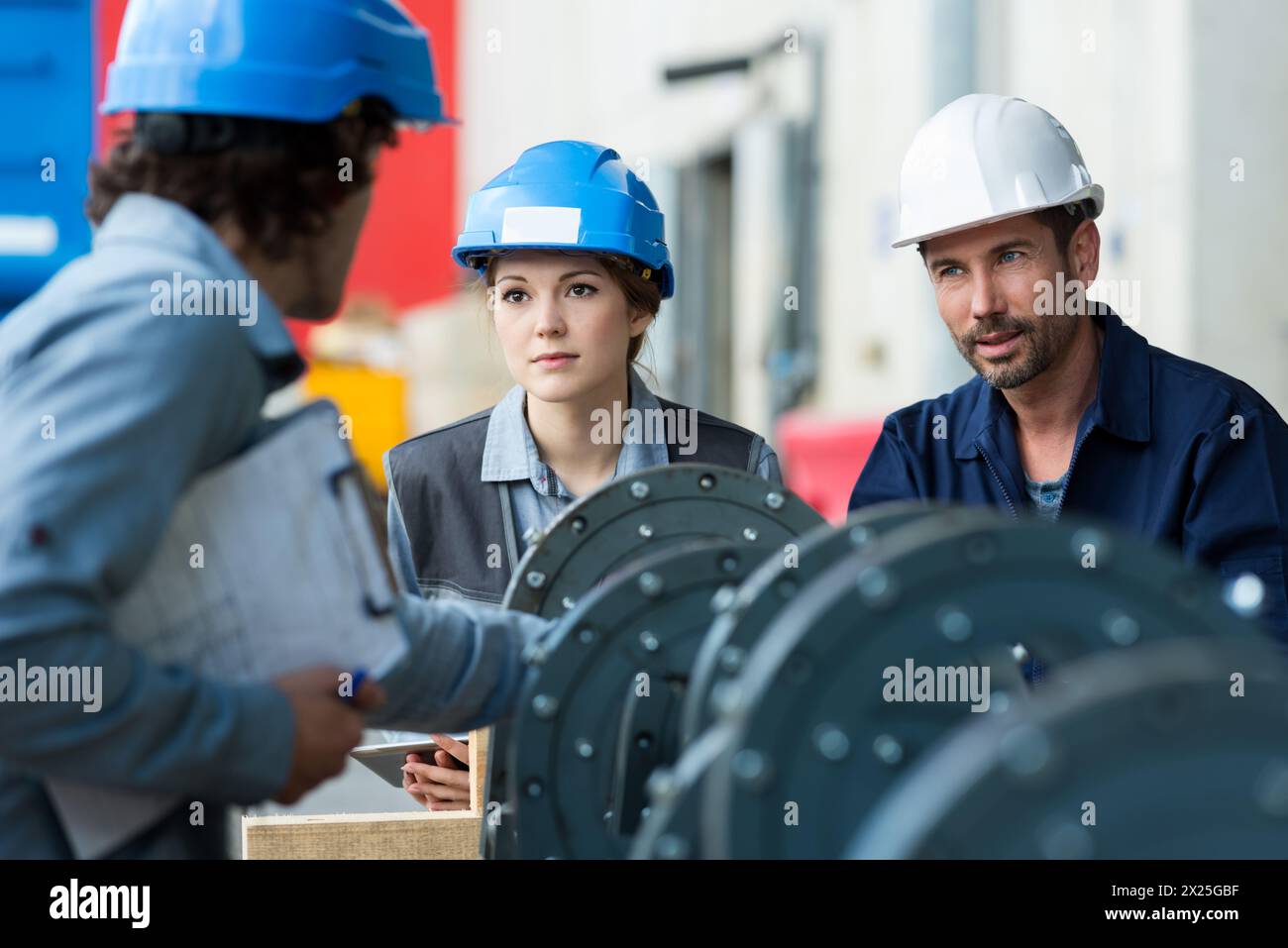 workers at a metal factory Stock Photo - Alamy