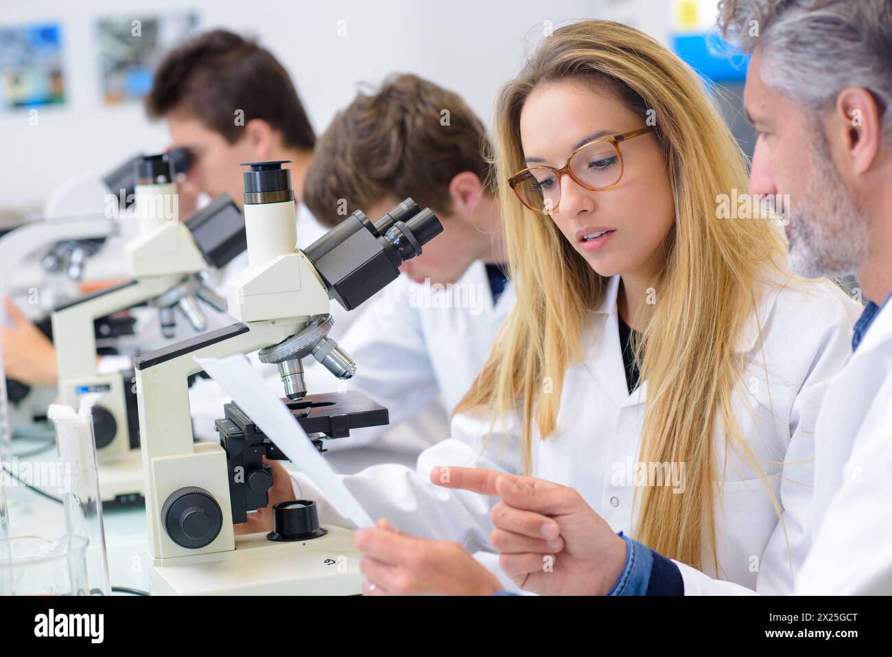 students and teacher during data record Stock Photo - Alamy