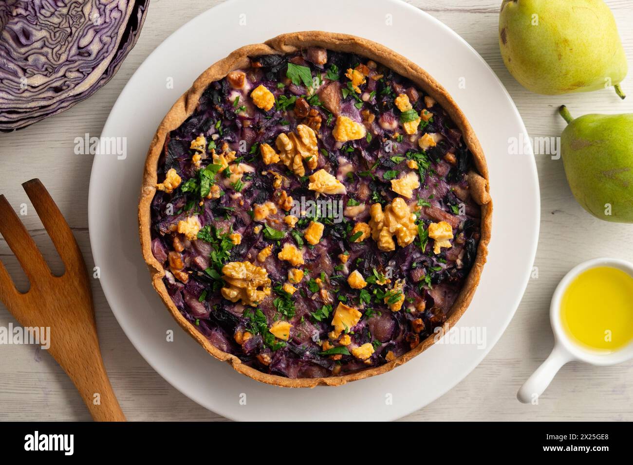 French quiche with red cabbage and vegetables. Traditional French ...