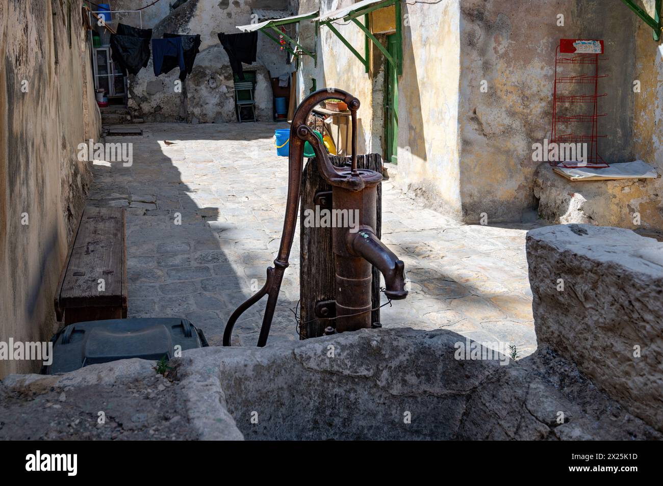 ancient water pump in Old City of Jerusalem. High quality photo Stock ...