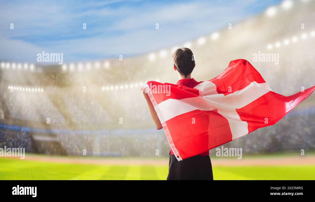 Denmark football supporter on stadium. Danish fans on soccer pitch ...