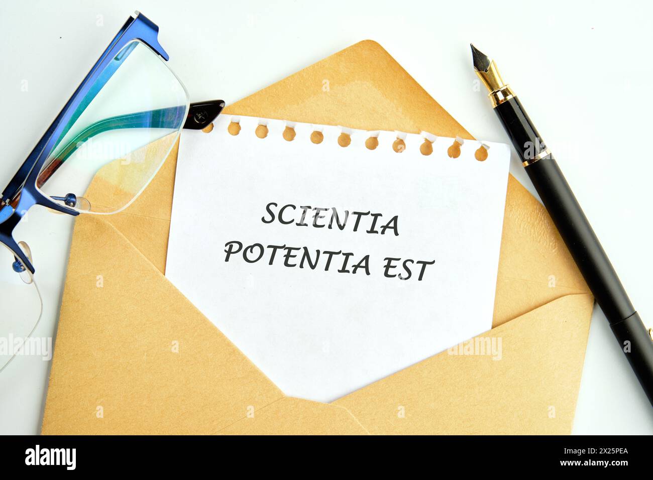 the phrase Scientia Potentia Est (Knowledge is power) written in Latin ...