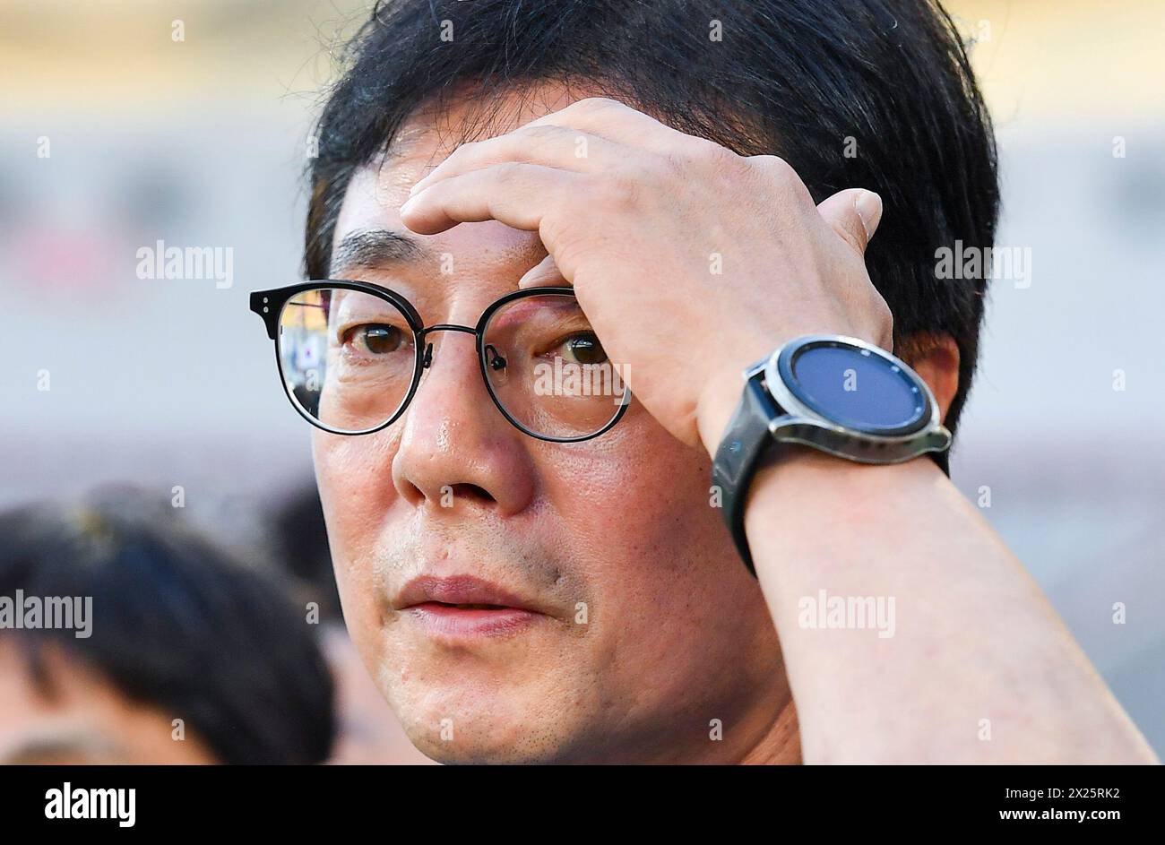 Doha, Qatar. 19th Apr, 2024. Head coach of South Korea Hwang Sun Hong ...