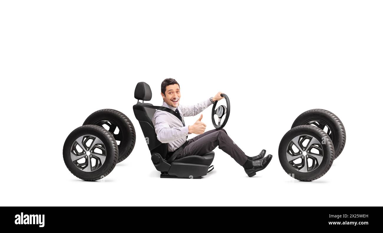 Guy sitting in a driver car seat and gesturing thumbs up isolated on ...