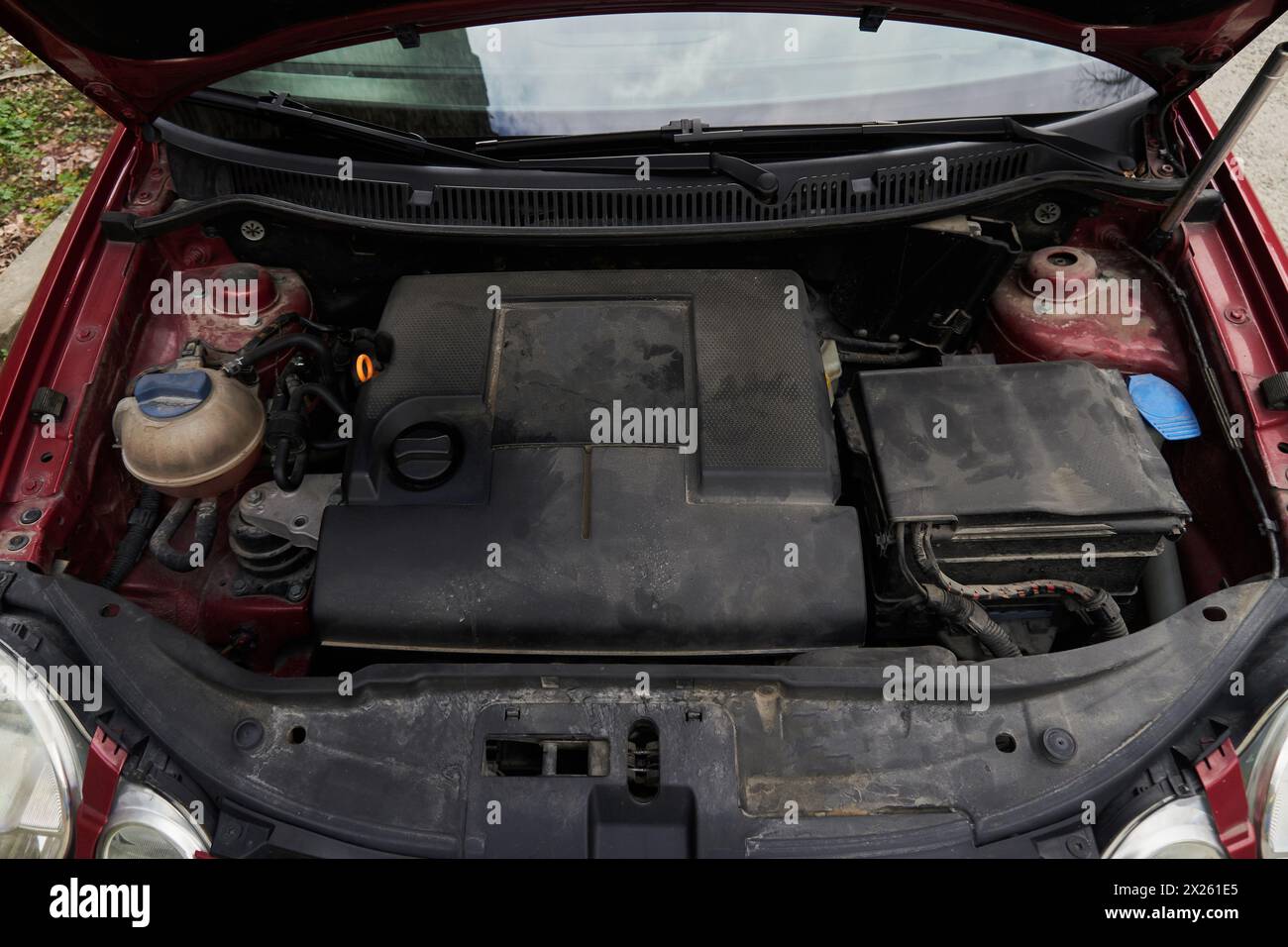 Dirty old car engine bay opened under the hood Stock Photo - Alamy