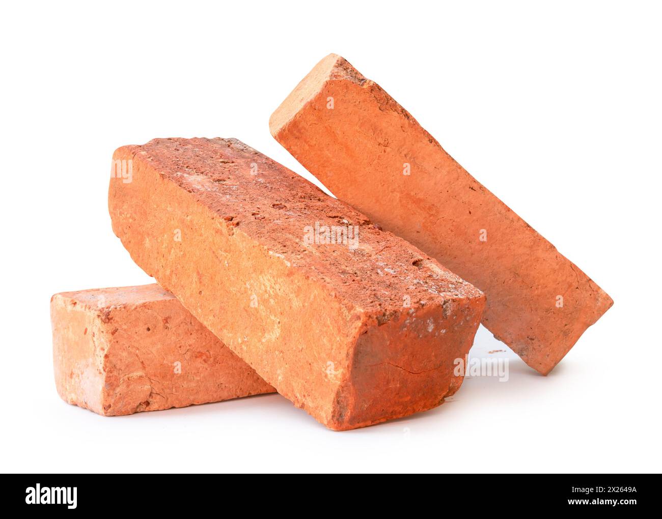 Side view of old cracked red or orange bricks in stack is isolated on ...