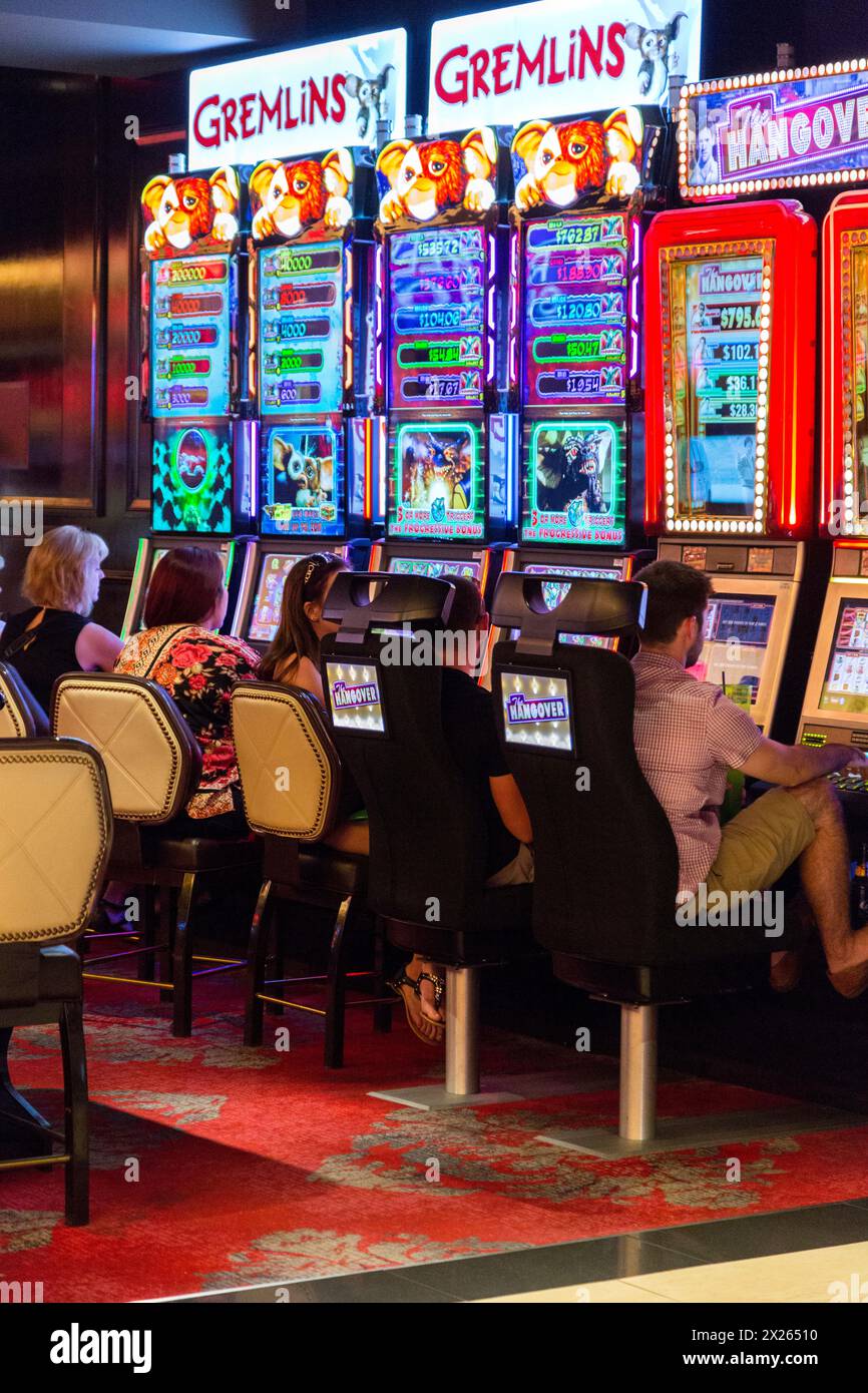 Las Vegas, Nevada. The Linq Casino. Men and Women Playing Slot Machines ...
